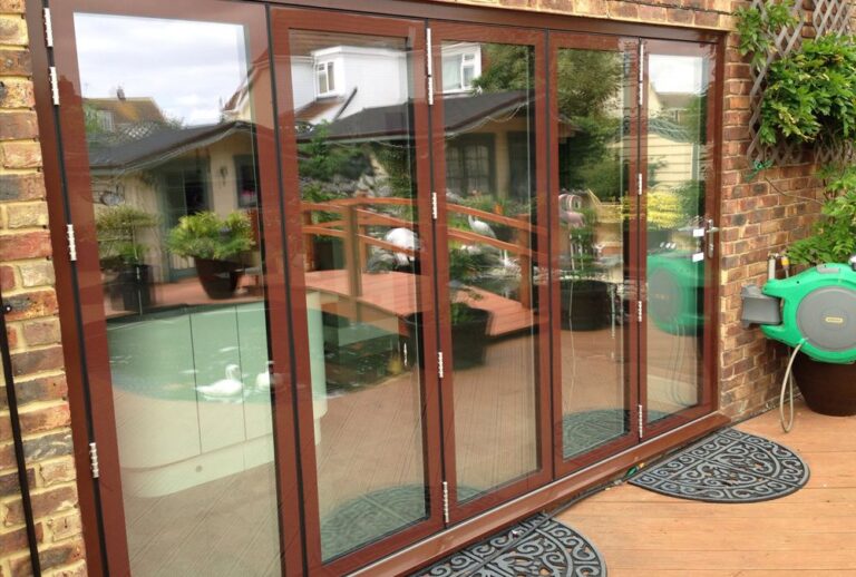 Glass Bi-Fold Doors - Moving Designs Limited
